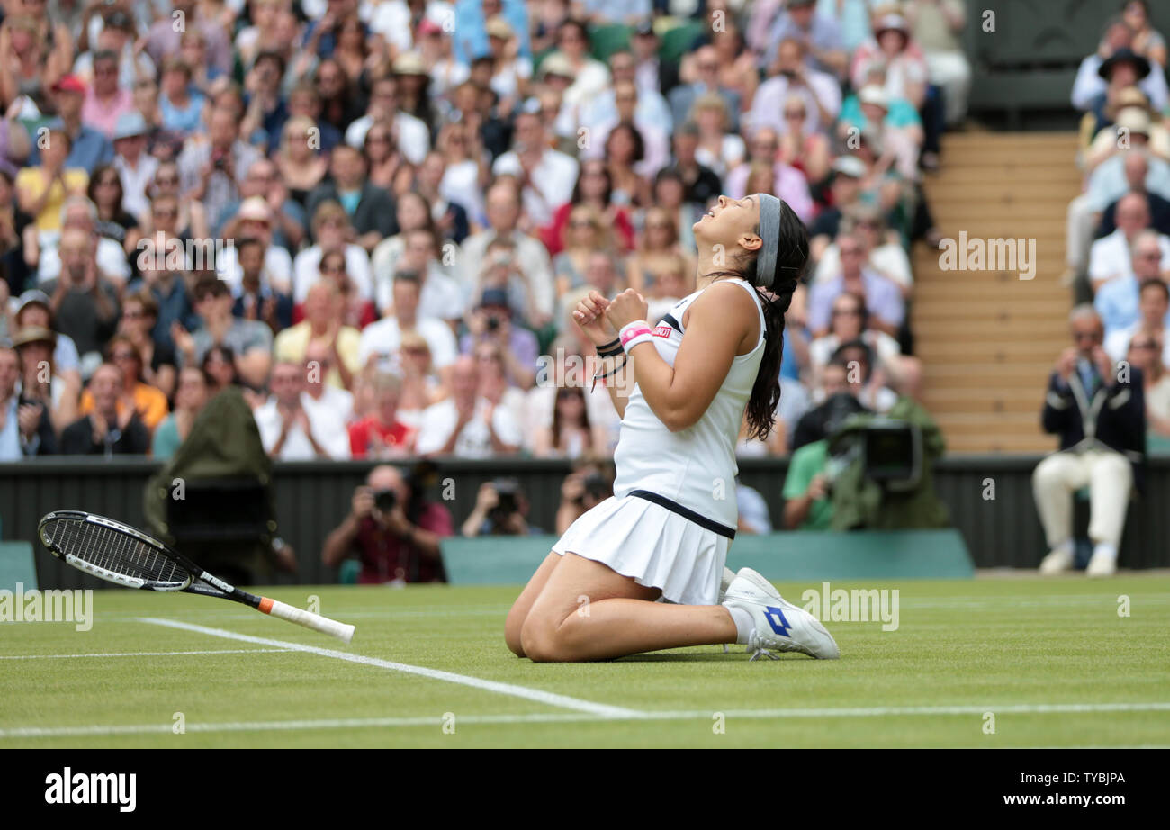 Marion Bartoli celebrates victory over Kirsten Flipkens on day ten of ...