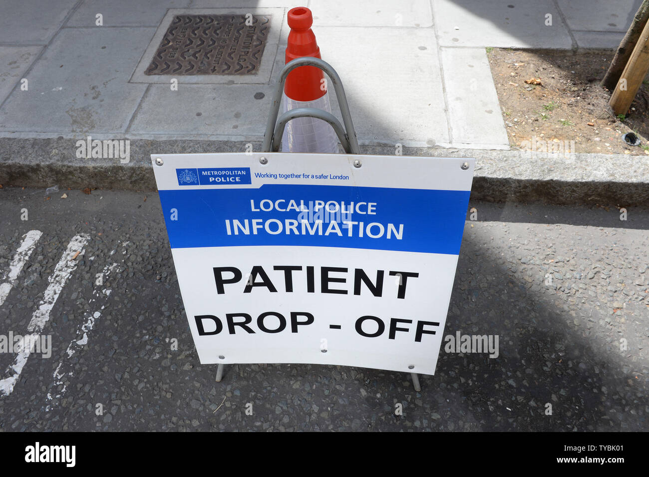 A local police sign outside the Lindo Wing of St. Mary's Hospital ahead ...