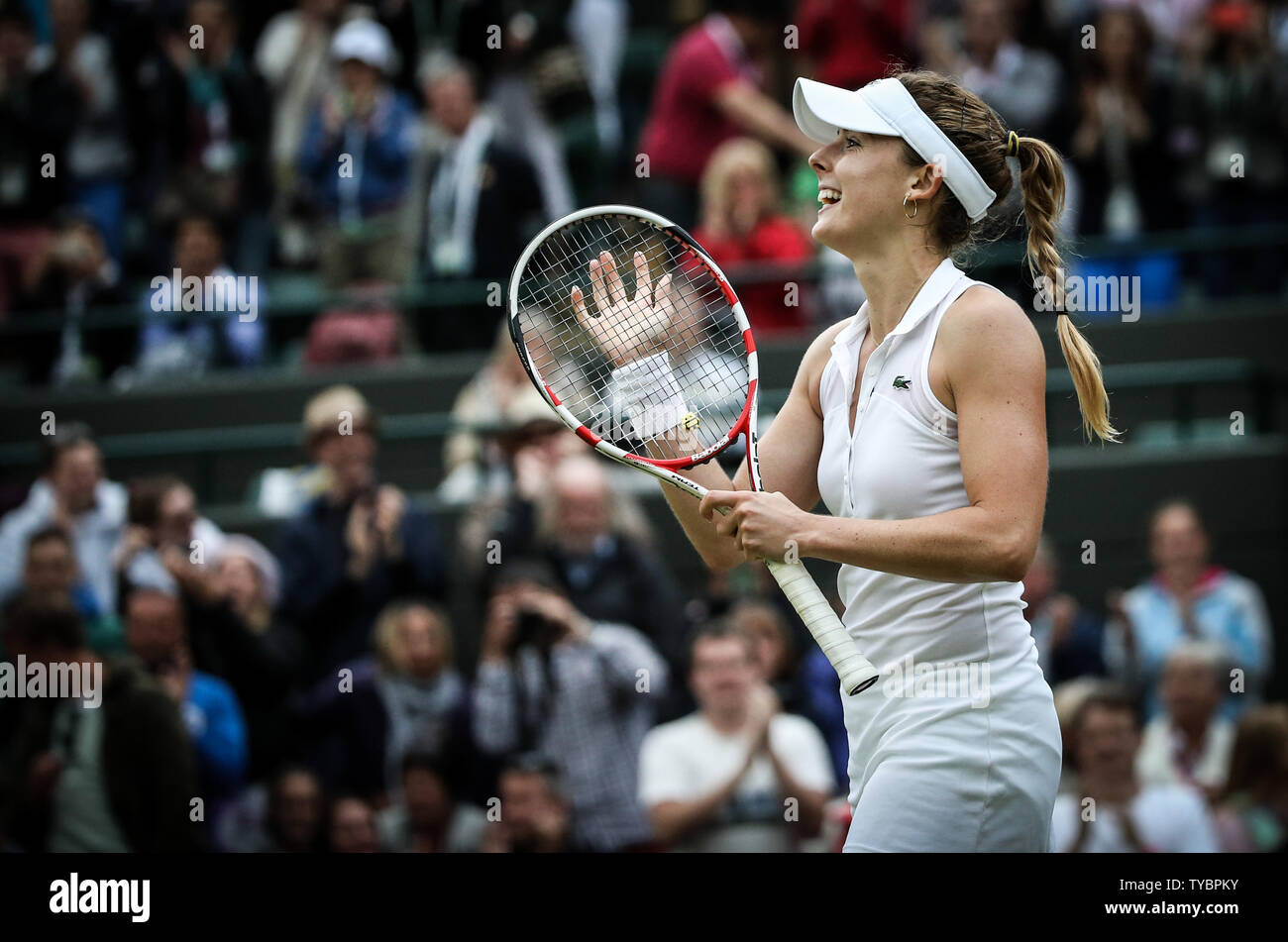 Alize Cornet celebrates her win in her match against Serena Williams on ...