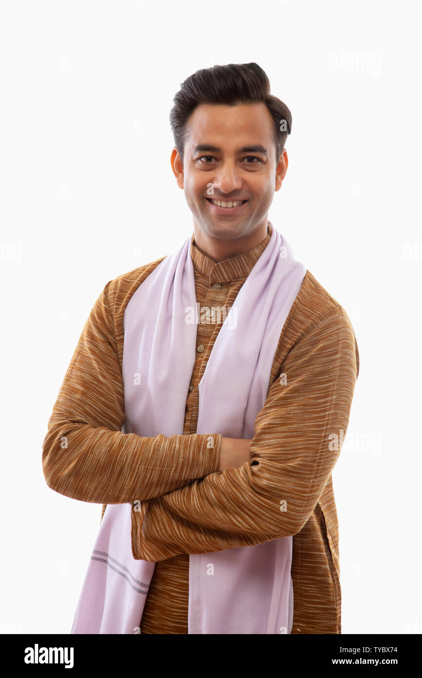 Portrait of a smiling village man standing with arms crossed Stock ...