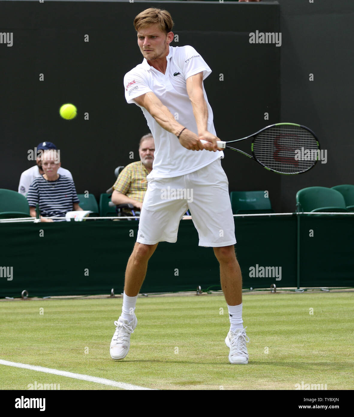 Belgium's Daniel Goffin returns the ball in his match against Great ...