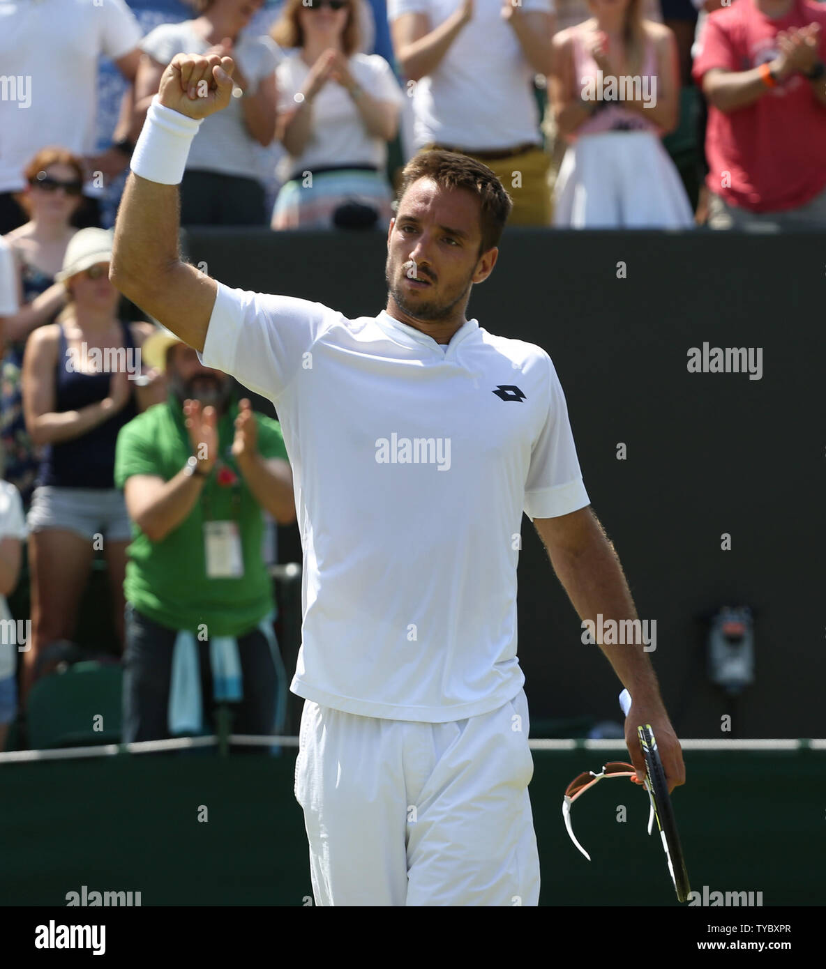 Serbia's Victor Troicki celebrates winning his match against Germany's ...