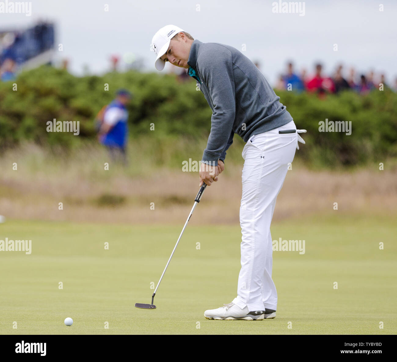 American Jordan Spieth putts on the 6th green on the first day of the ...