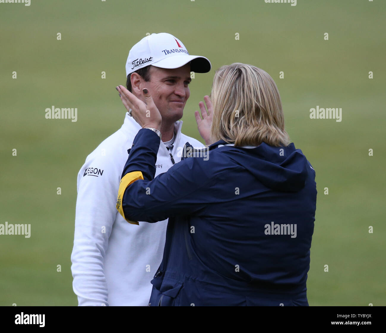 American Zach Johnson greets his wife Kim after winning the 144th Open ...