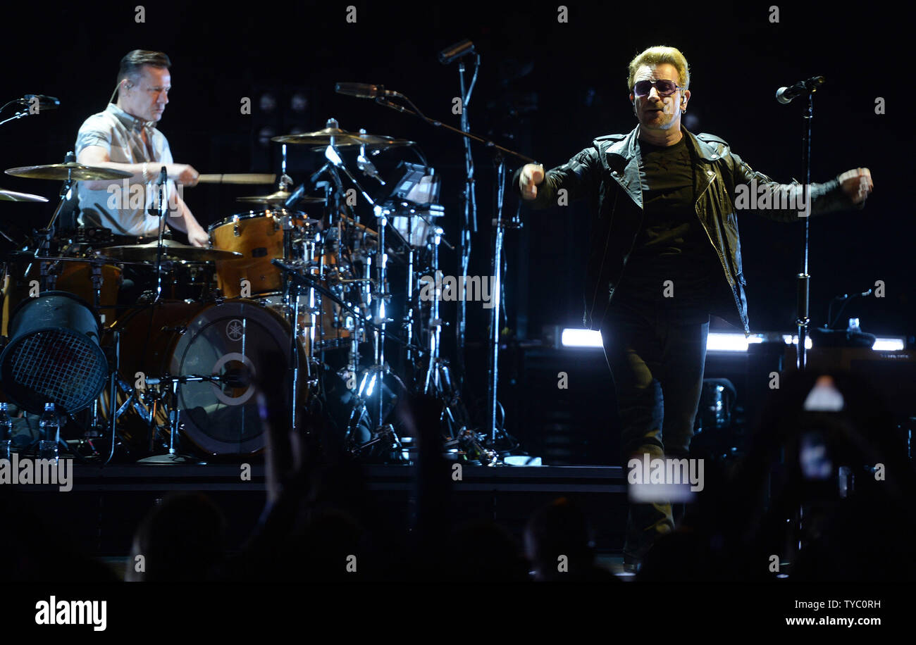 Irish singer Bono and drummer Larry Mullen Jr. perform with U2 at the ...