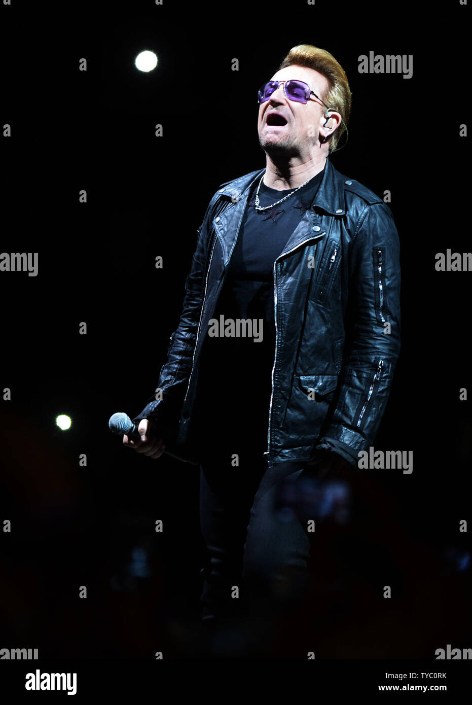 Irish singer Bono performs with U2 at the O2 Arena in London on October ...