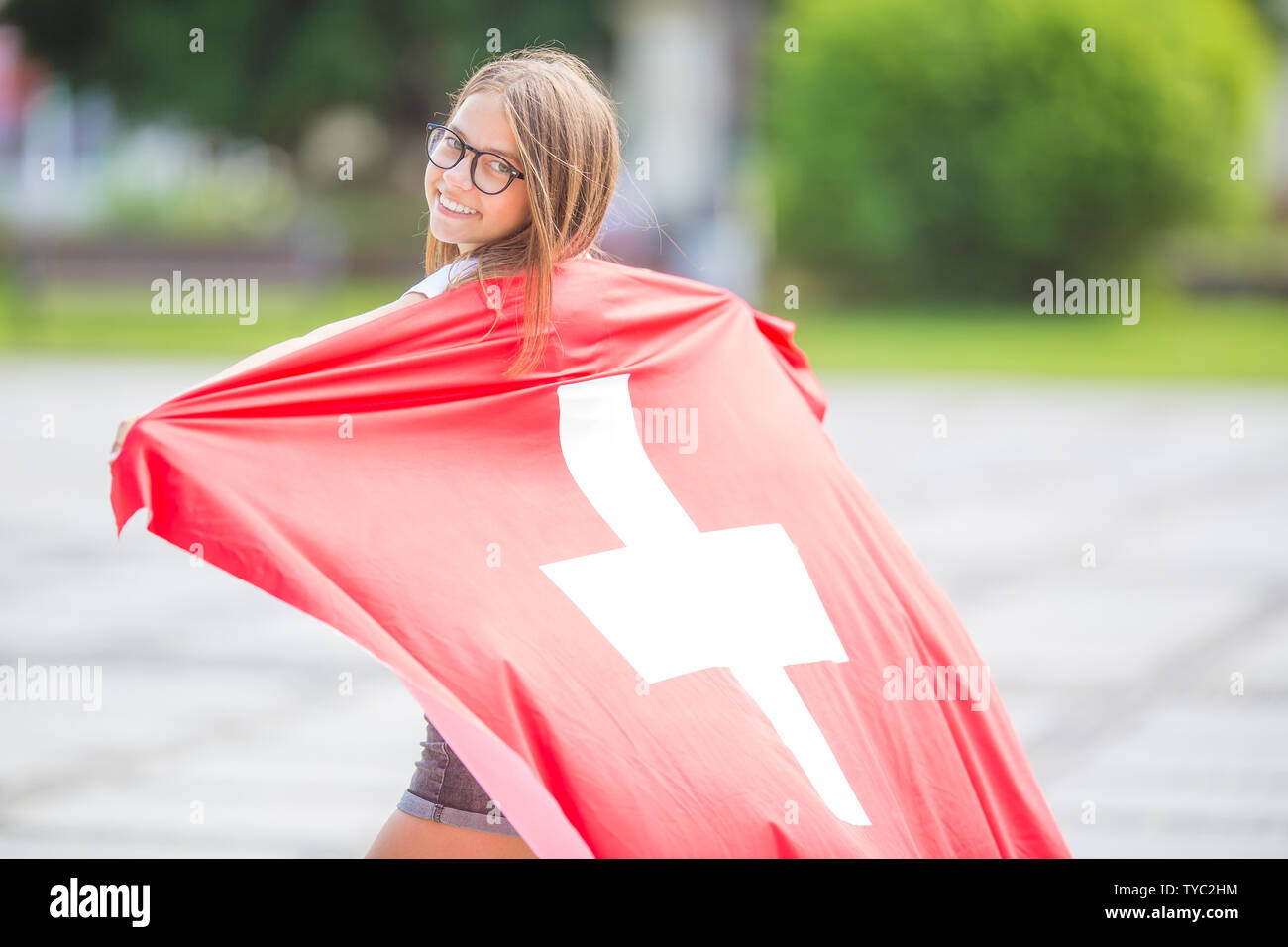 Girl holding national flag walking hi-res stock photography and images ...