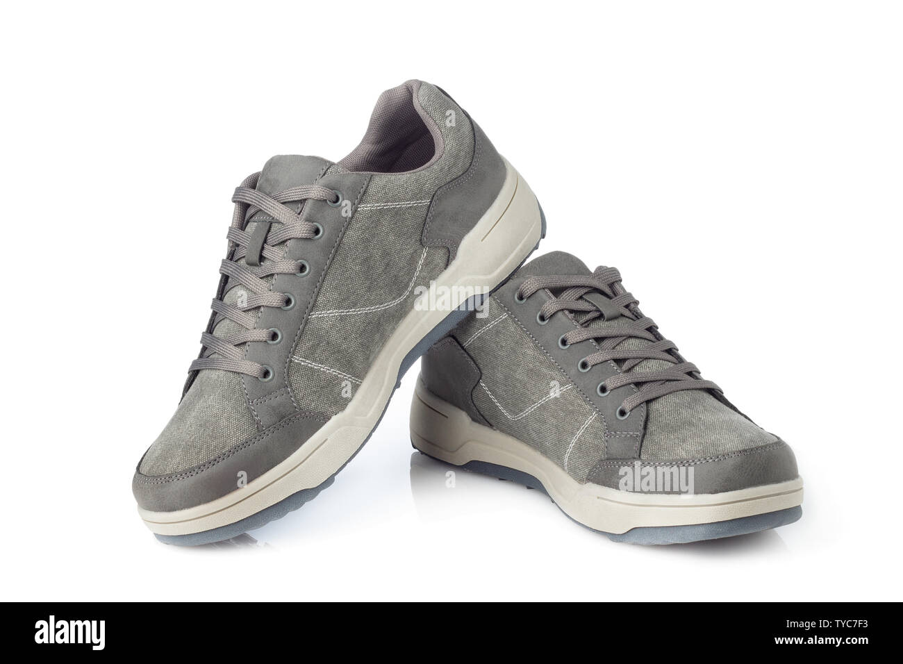 Gray sneakers isolated on white background Stock Photo - Alamy