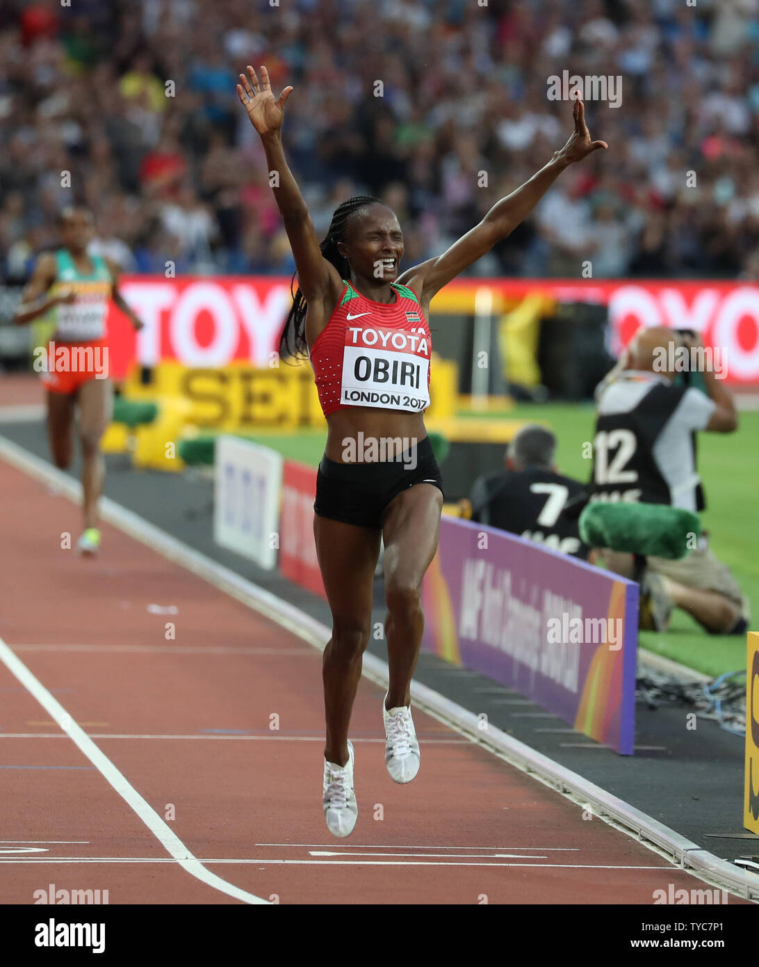 Kenyan Hellen Obiri jumps for joy after winning the Women's 5000 Meters ...