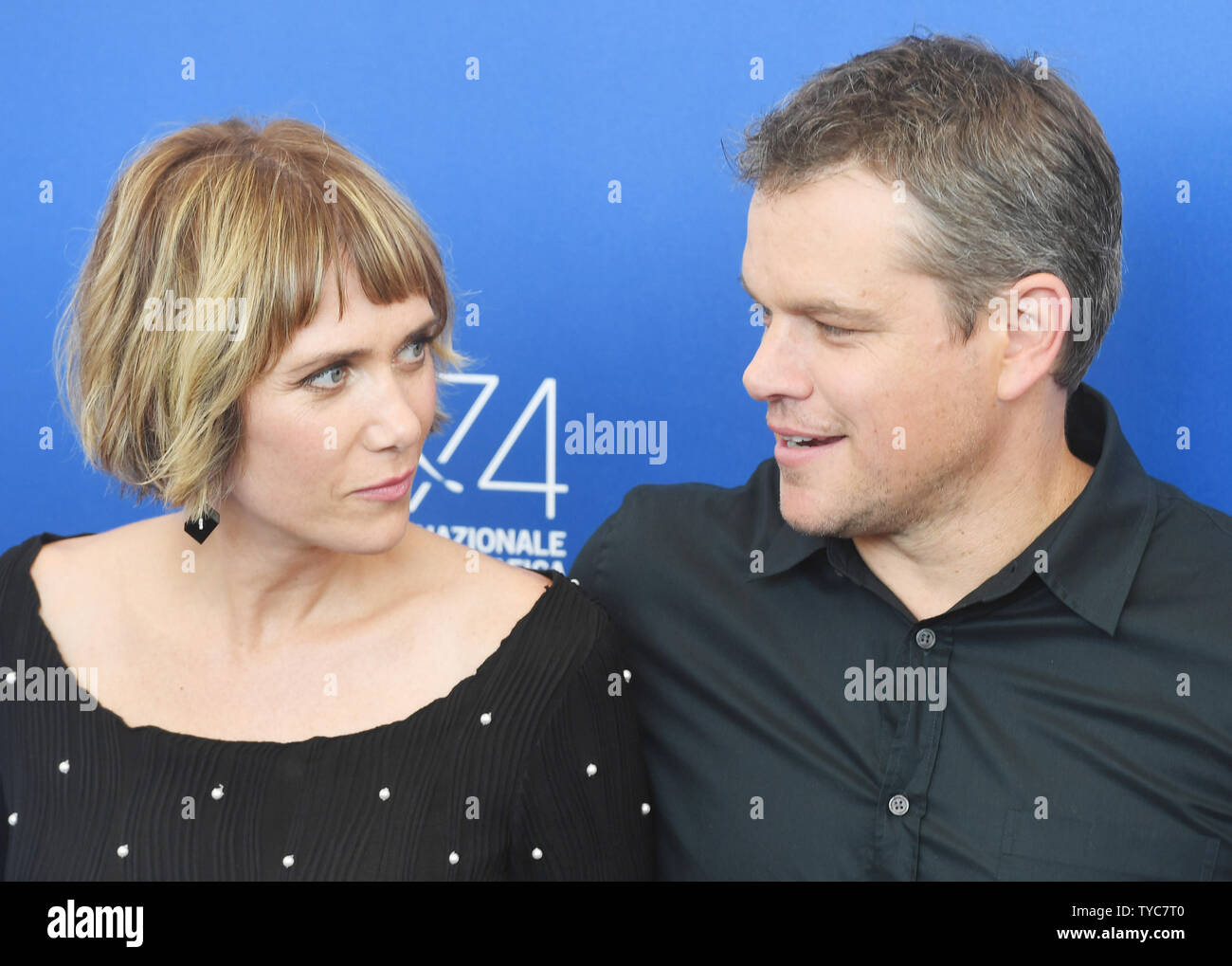 American actress Kristen Wiig and actor Matt Damon attend a photo call ...