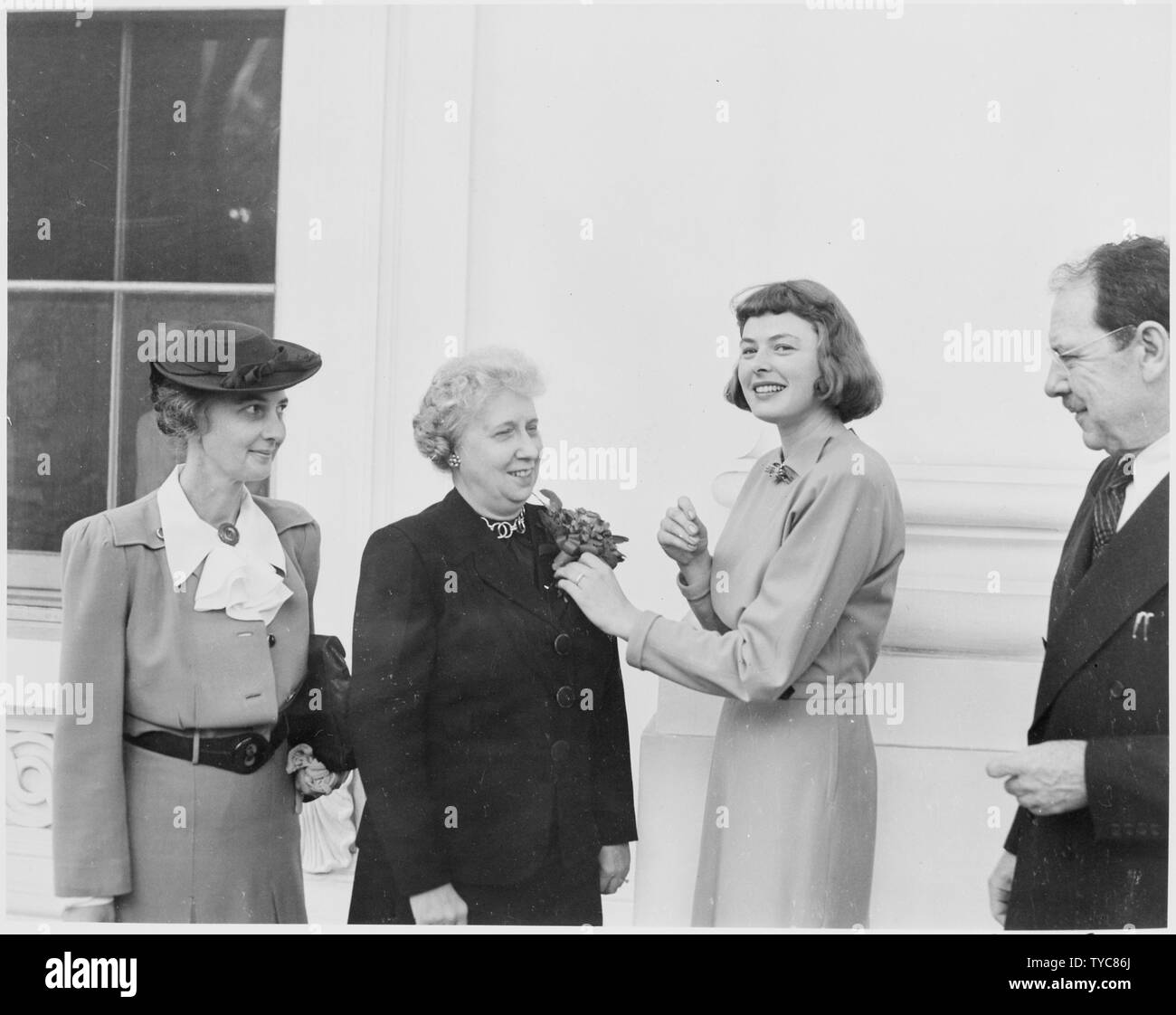 Photograph of First Lady Bess Truman receiving a community chest award ...