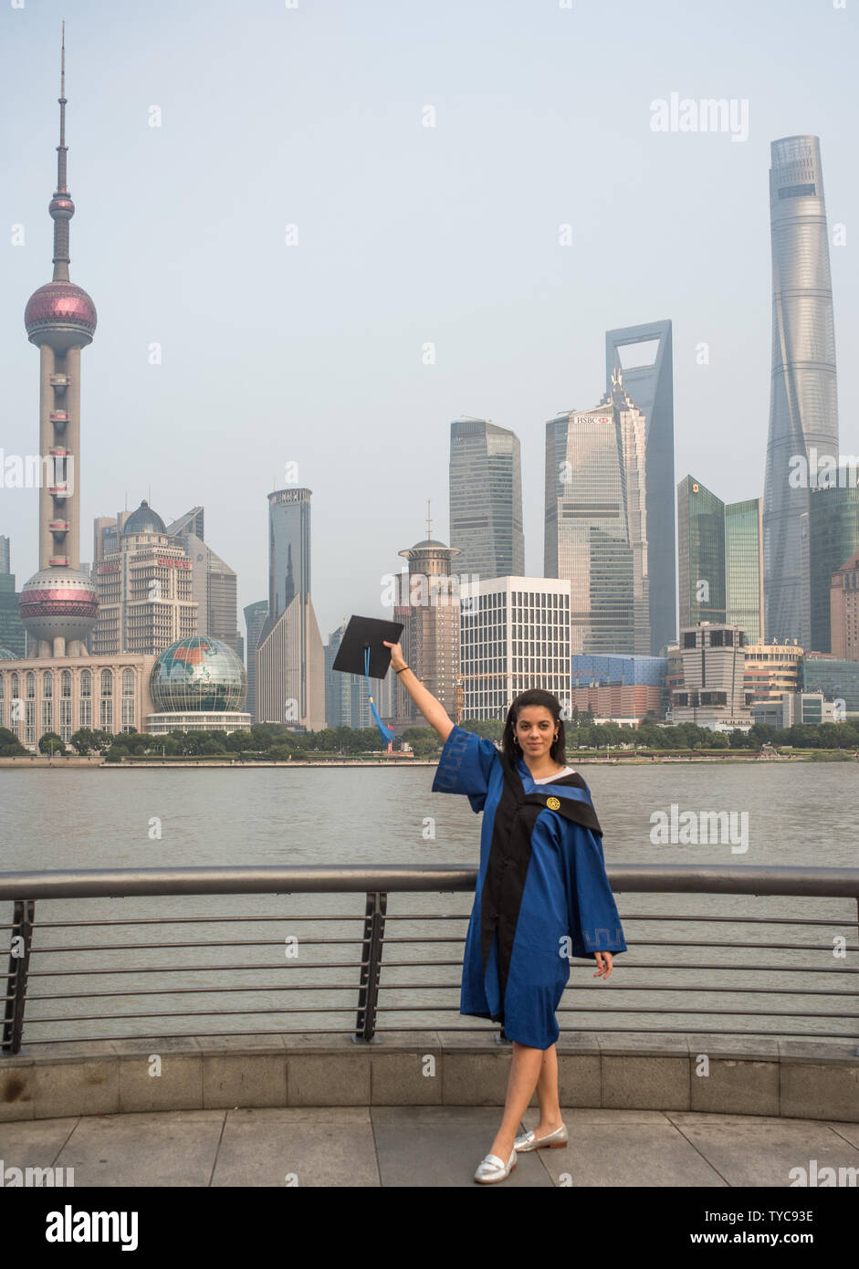 Foreign girls take graduation photos in the Bund Stock Photo - Alamy