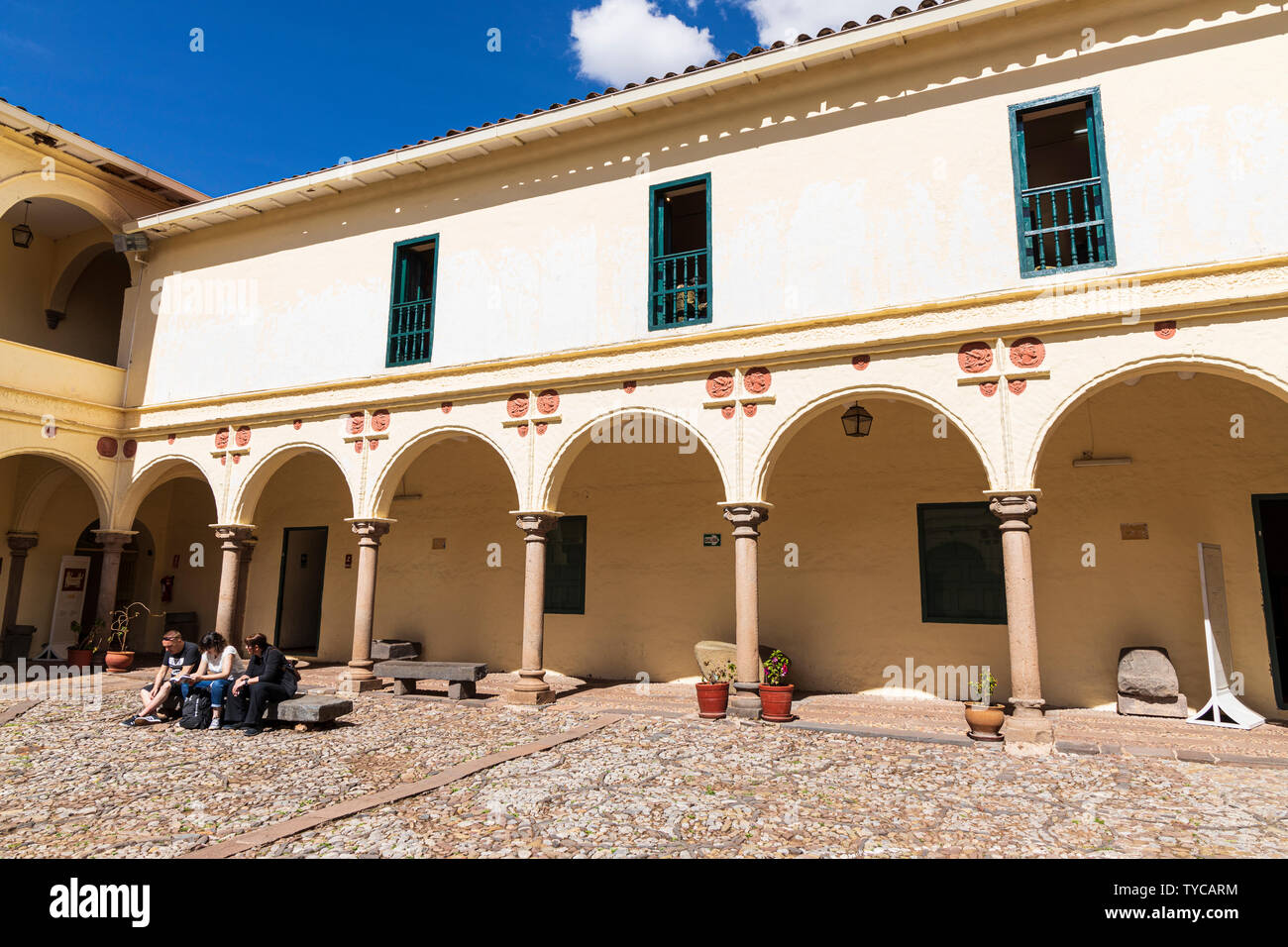 Arched cloisters in the courtyard of the Inca museum in Cusco, Peru ...