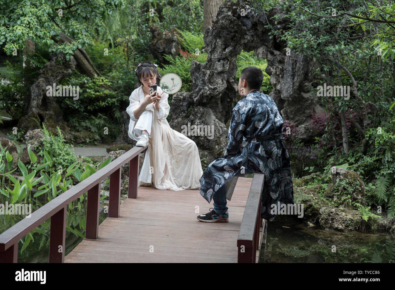 Chinese couple in traditional Chinese clothes. Photographed in Chengdu ...