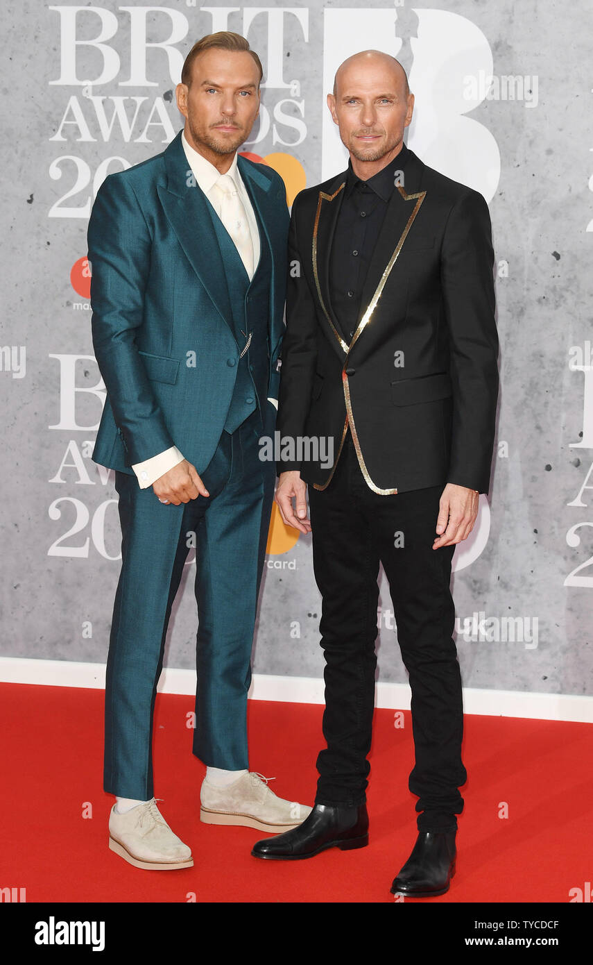 British singers Matt Goss and Luke Goss from Bros attend the Brit Awards at O2 Arena in London ...