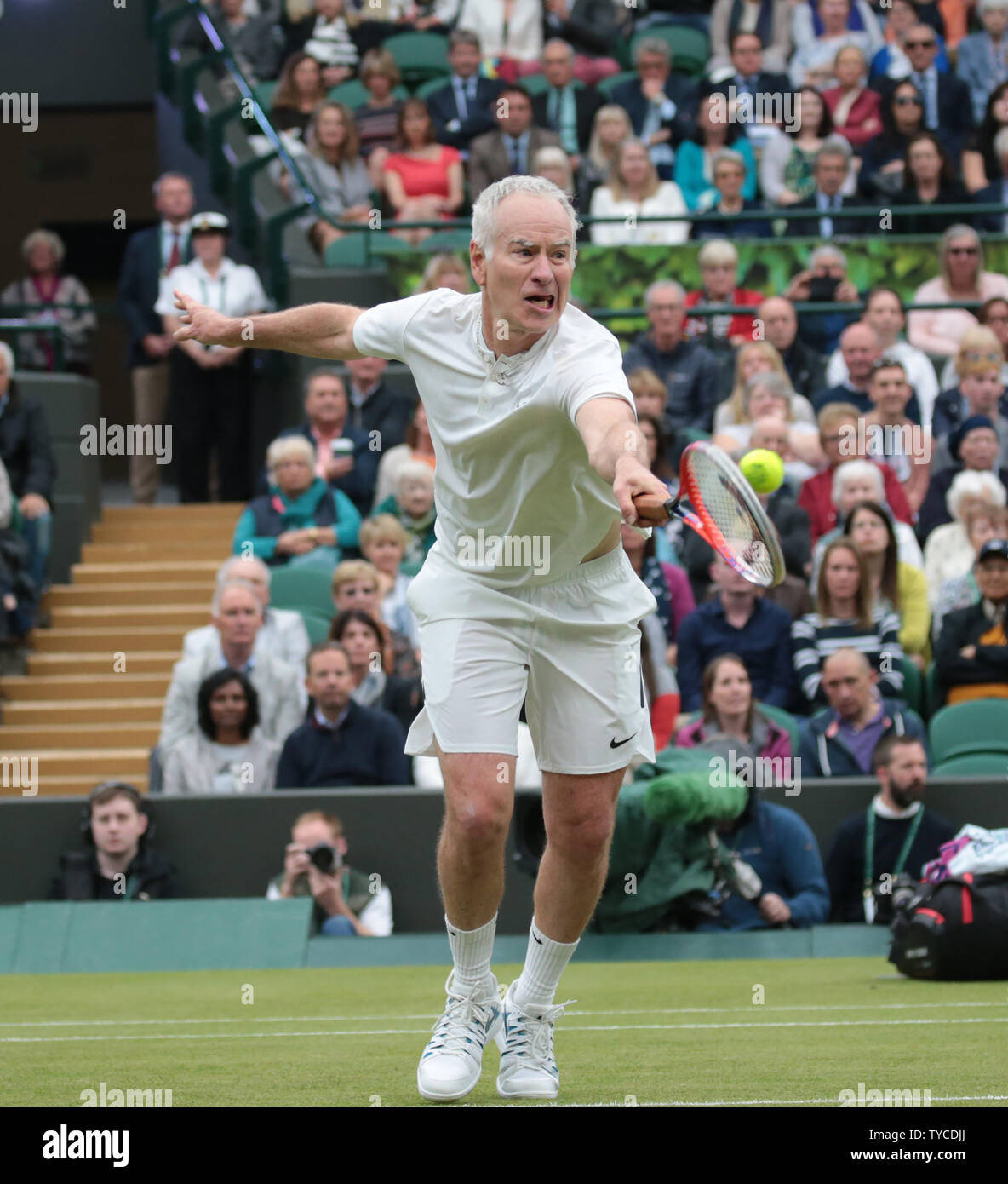 American John Mcenroe plays an exhibition doubles match against ...
