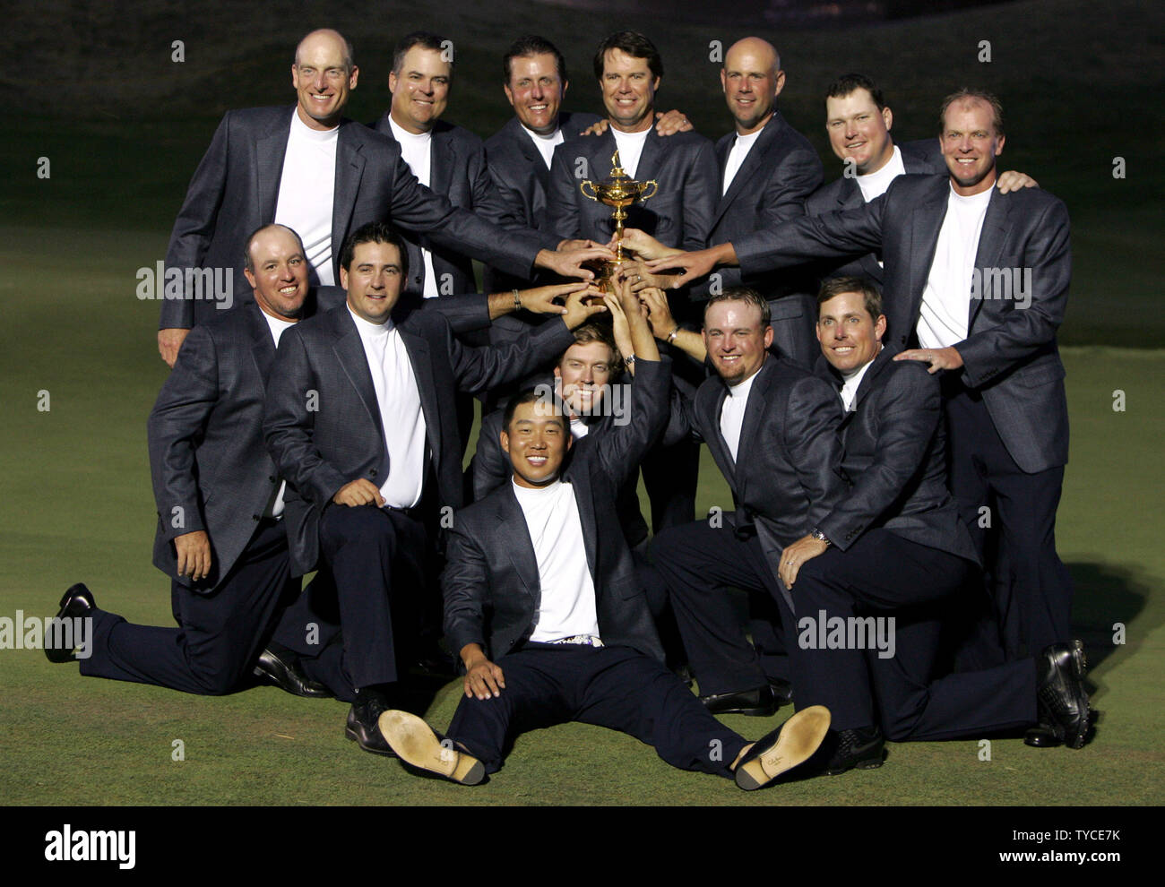 Team USA poses on the 18th green with the Ryder Cup after defeating ...