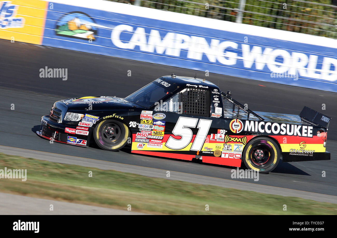 Kyle Busch runs through turn 3 enroute to winning the NASCAR Heluva ...