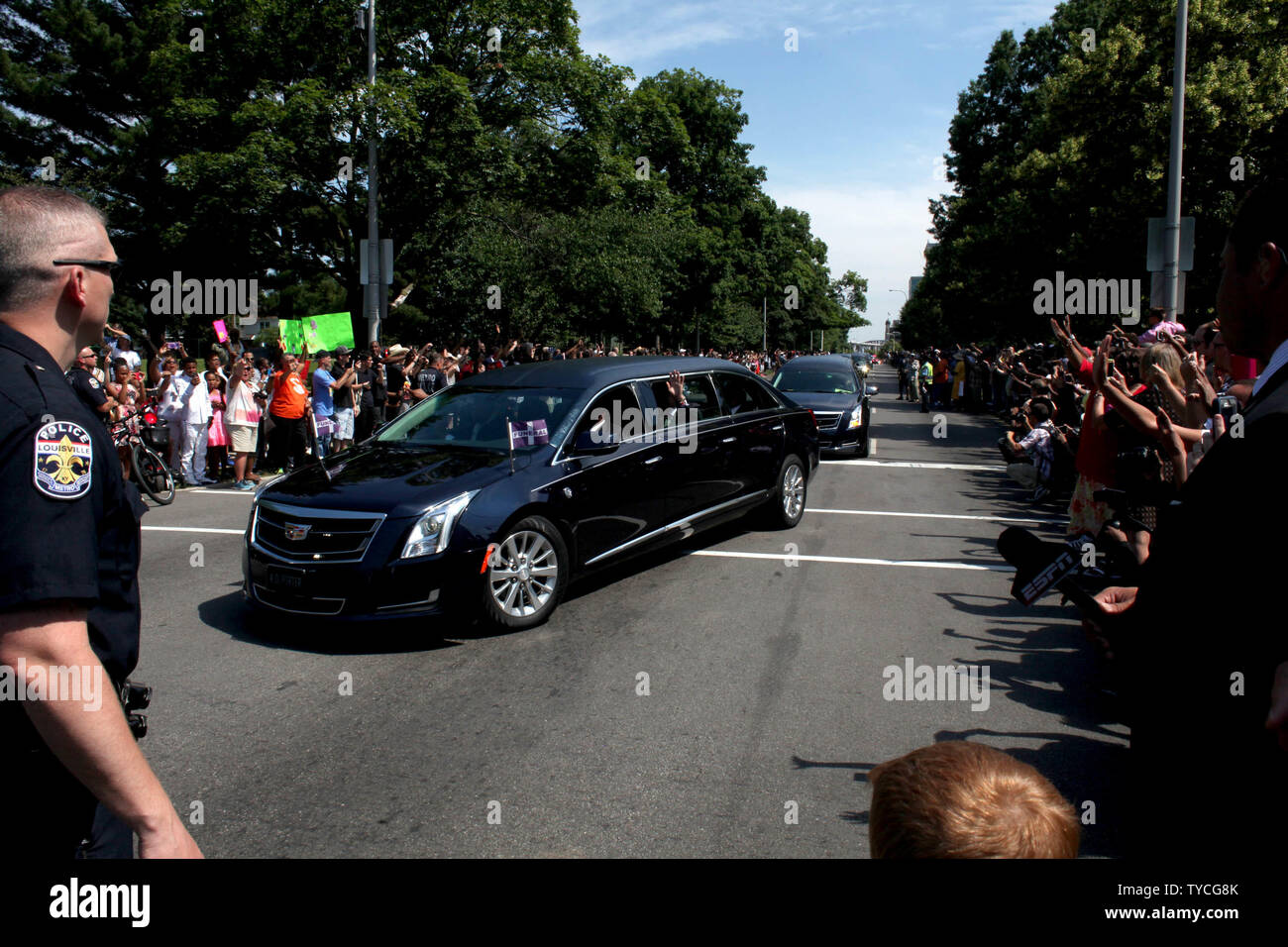 The Muhammad Ali funeral procession is seen on 9th street in Louisville ...