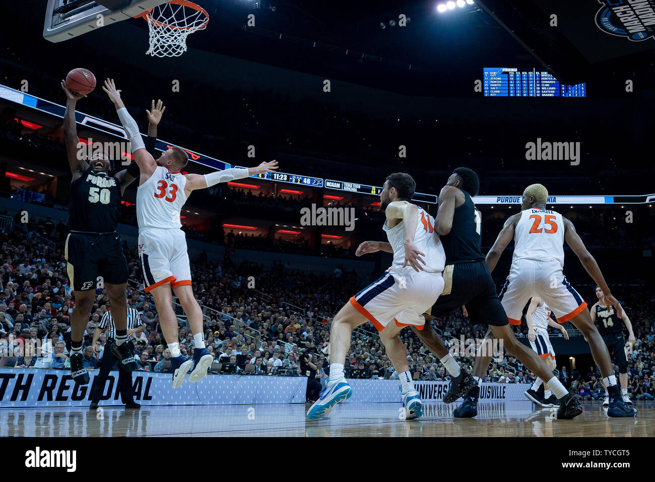 Virginia Cavaliers center Jack Salt (33) blocks the shot of Purdue ...