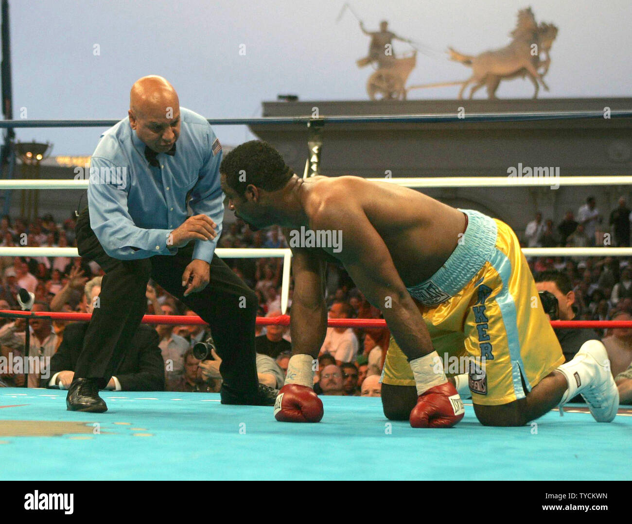 Unbeaten Calvin Brock, of Charlotte NC, is knocked down for the first ...