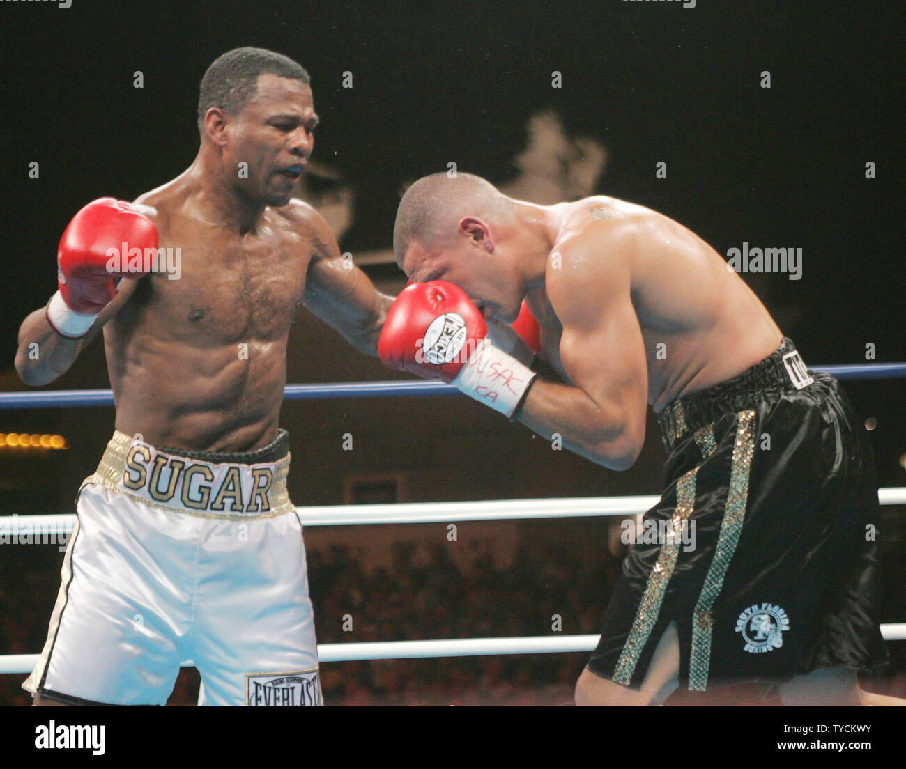 Two-time world champion Sugar Shane Mosley attacks during his fight ...