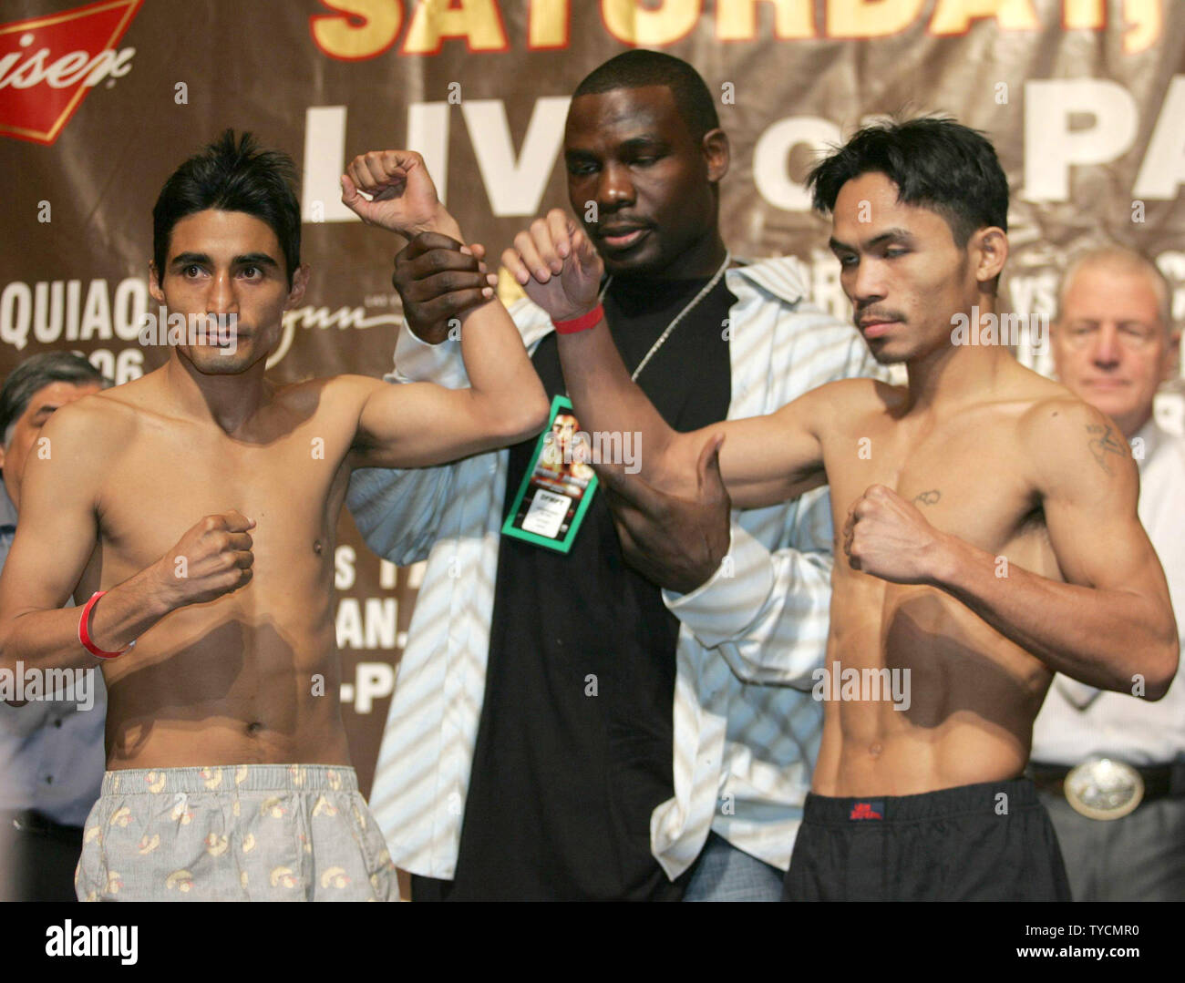 Champion Eric Morales of Mexico (left) weighed 130 pounds and ...