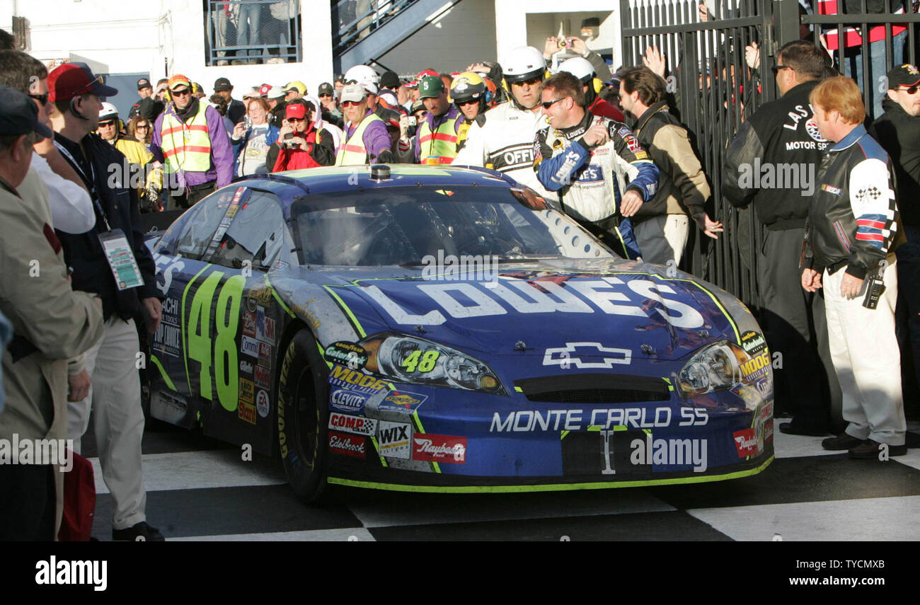 Jimmie Johnson pulls into the winners circle after winning the UAW ...