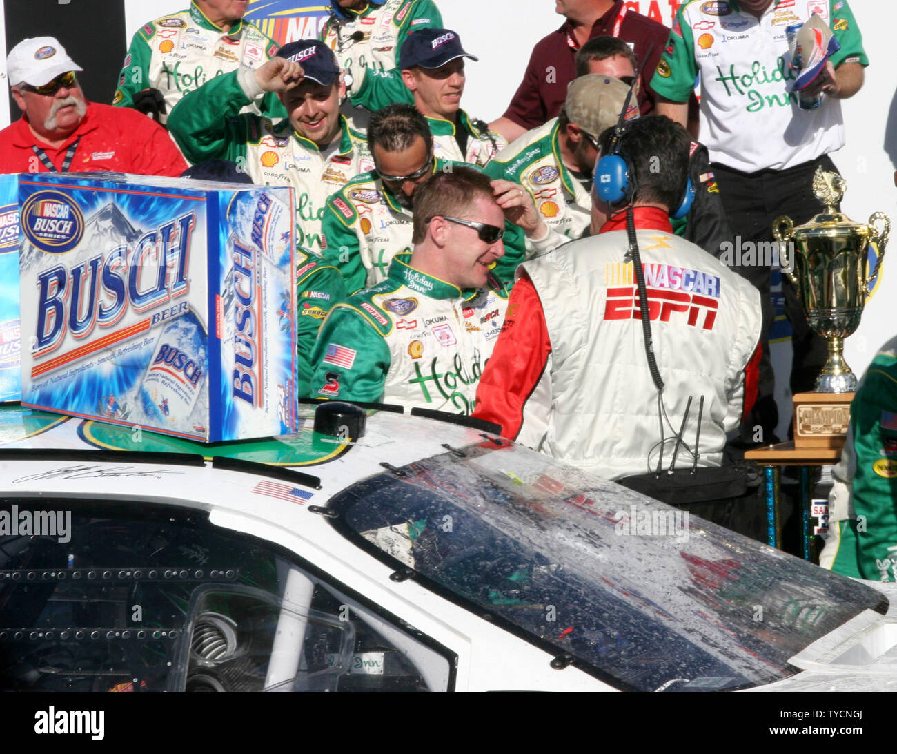 Race car driver Jeff Burton celebrates his victory at the Sams Town 300 ...