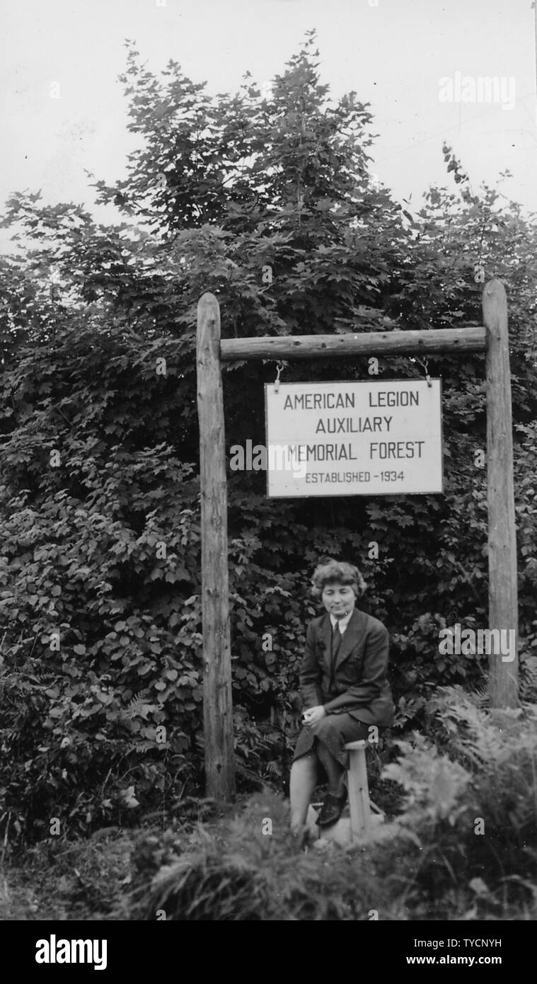 Photograph of Miss March-Mount at Sign for American Legion Auxiliary ...