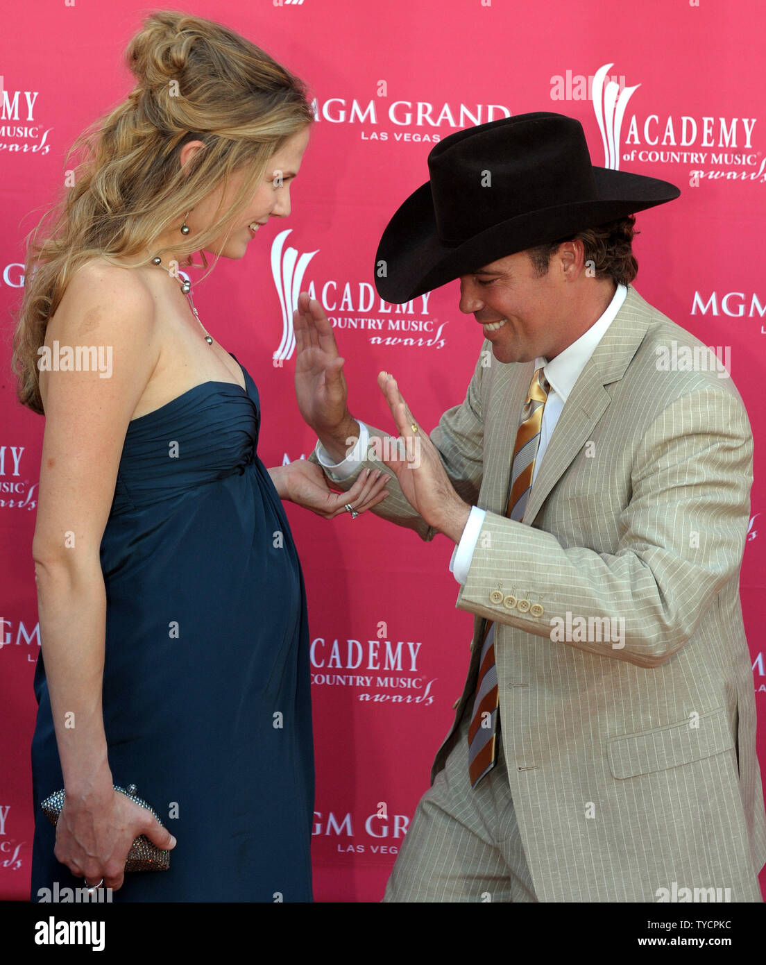 Jessica and Clay Walker, whose son will be named William, arrive for ...