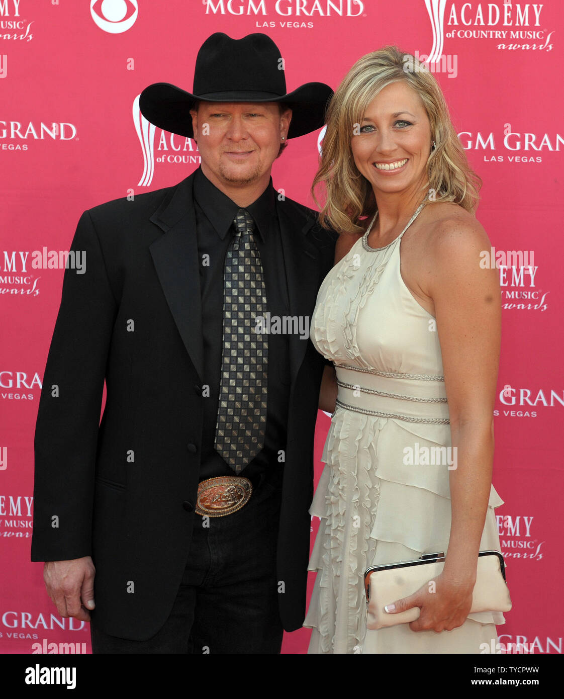 Tracey Lawrence and his wife Becca arrive for the 43rd Academy of ...