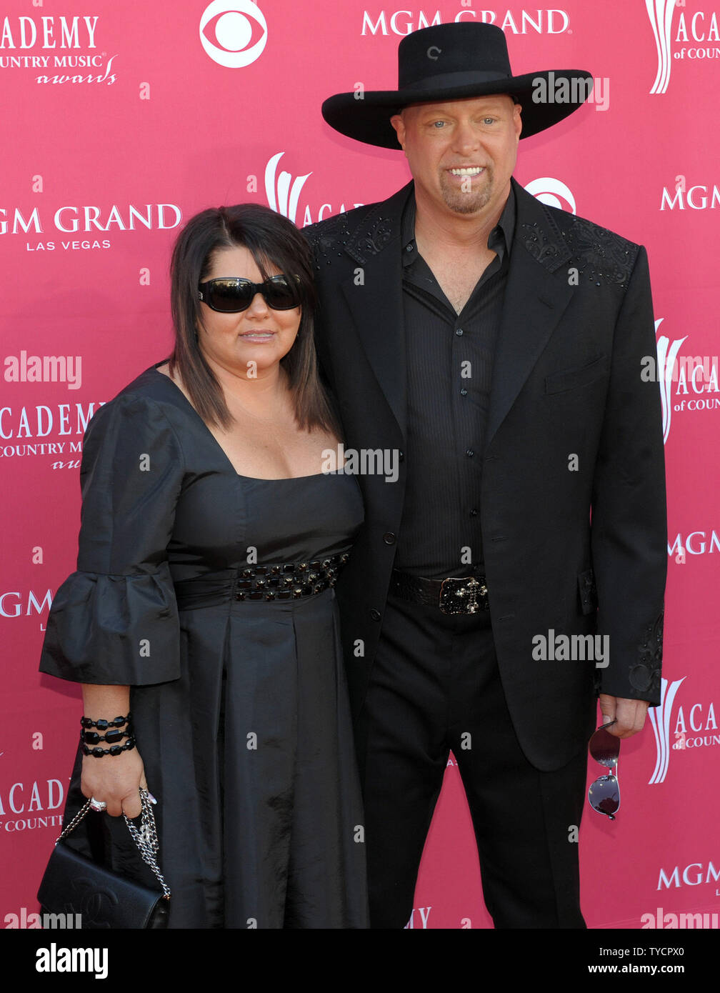 Country music artist Eddie Montgomery and his wife Tracy (L) arrive for ...