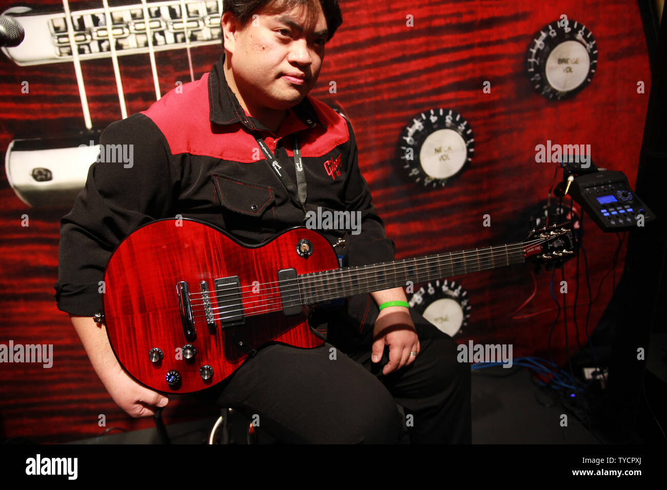 Gibson product specialist Aljon Go shows their newest model the Dark ...