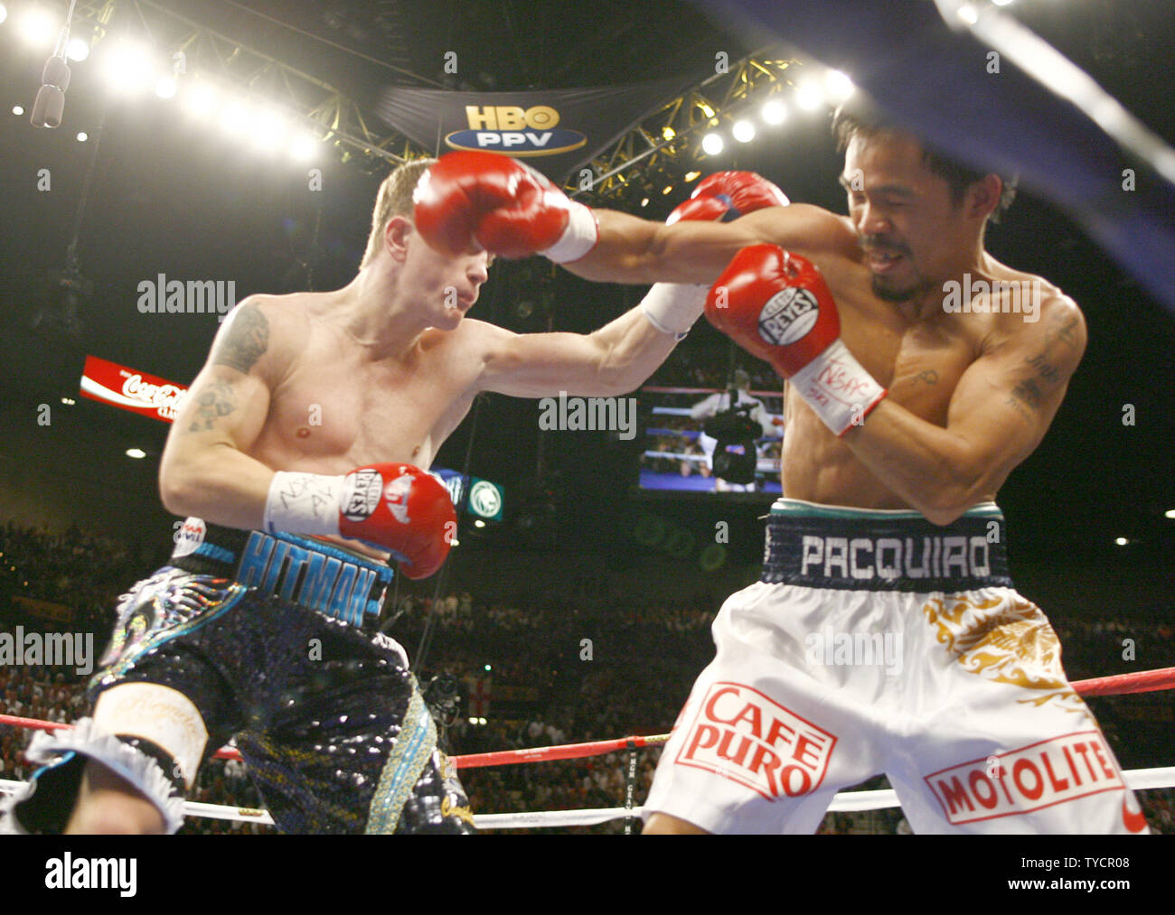Ricky Hatton of Manchester, England attacks Manny Pacquiao of the ...