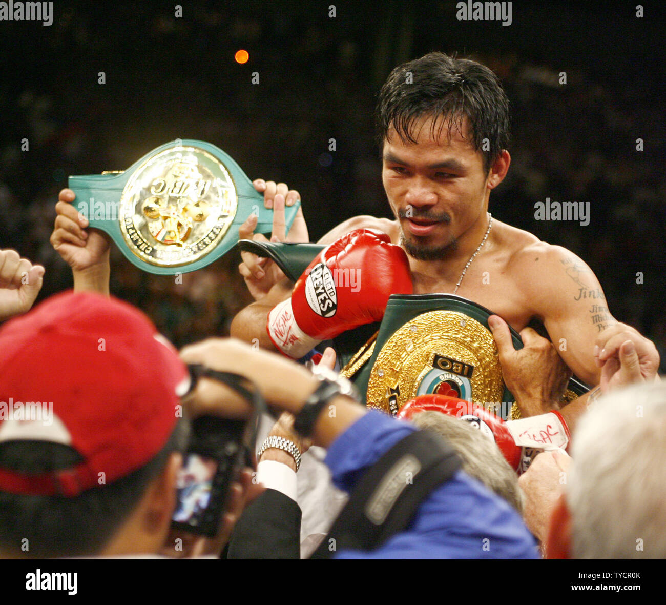 Manny Pacquiao of the Philippines celebrates winning his fight with ...