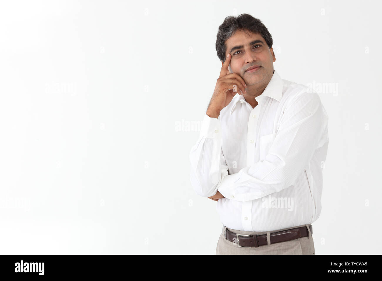 Indian businessman thinking Stock Photo - Alamy