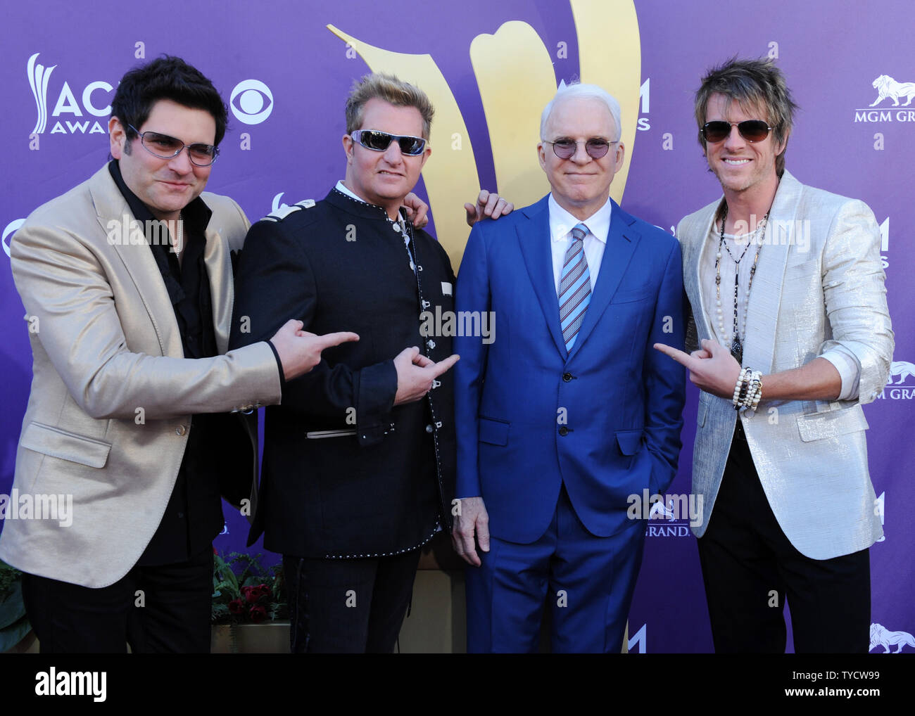 Members of the band Rascal Flatts and actor Steve Martin arrive at the ...