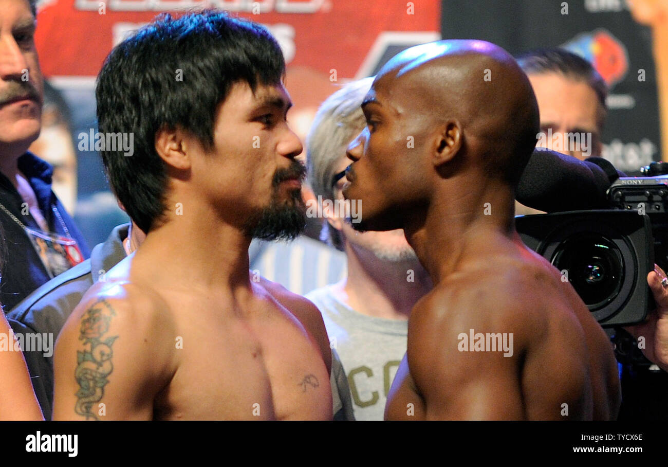 Boxers Manny Pacquiao, left, and Timothy Bradley face off during the ...