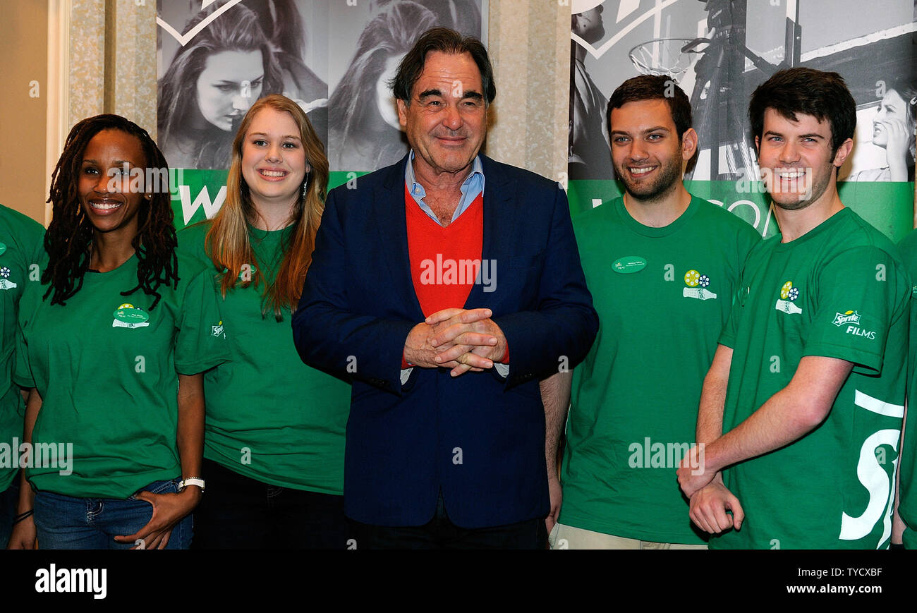 Director Oliver Stone © meets with student finalists from left, Meja ...