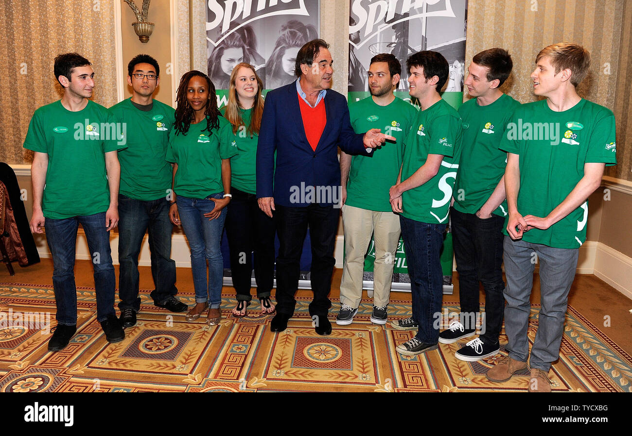 Director Oliver Stone (c) meets with student finalists from left, Noah ...