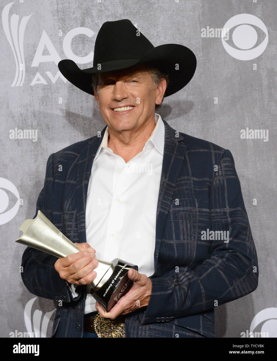 Musician George Strait appears backstage with the Entertainer of the ...