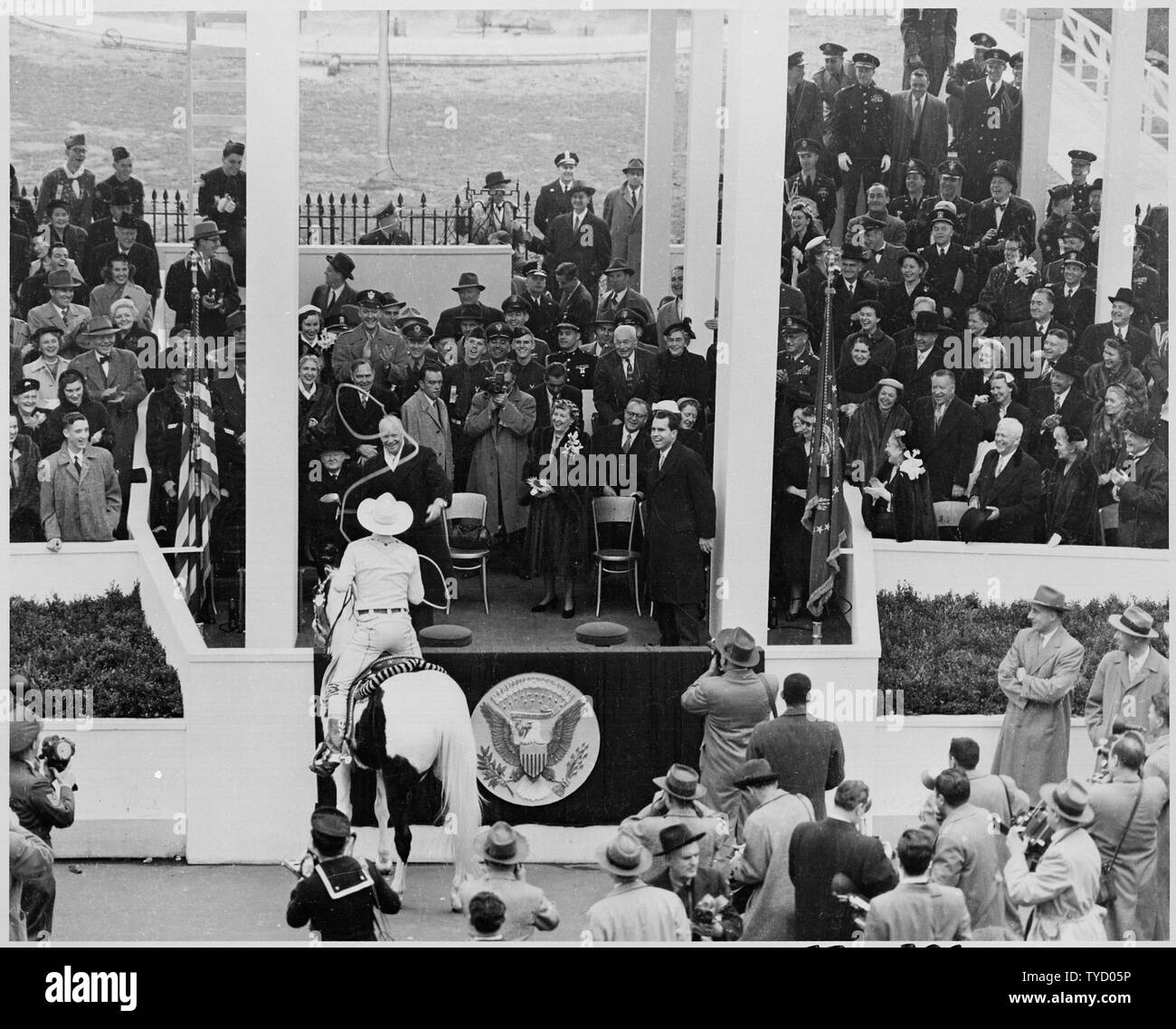 Photograph of President Dwight D. Eisenhower being lassoed by a cowboy ...