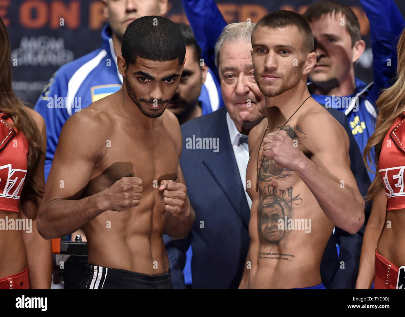 Boxer Gamalier Rodriguez (L) and Vasyl Lomachenko face off at the ...