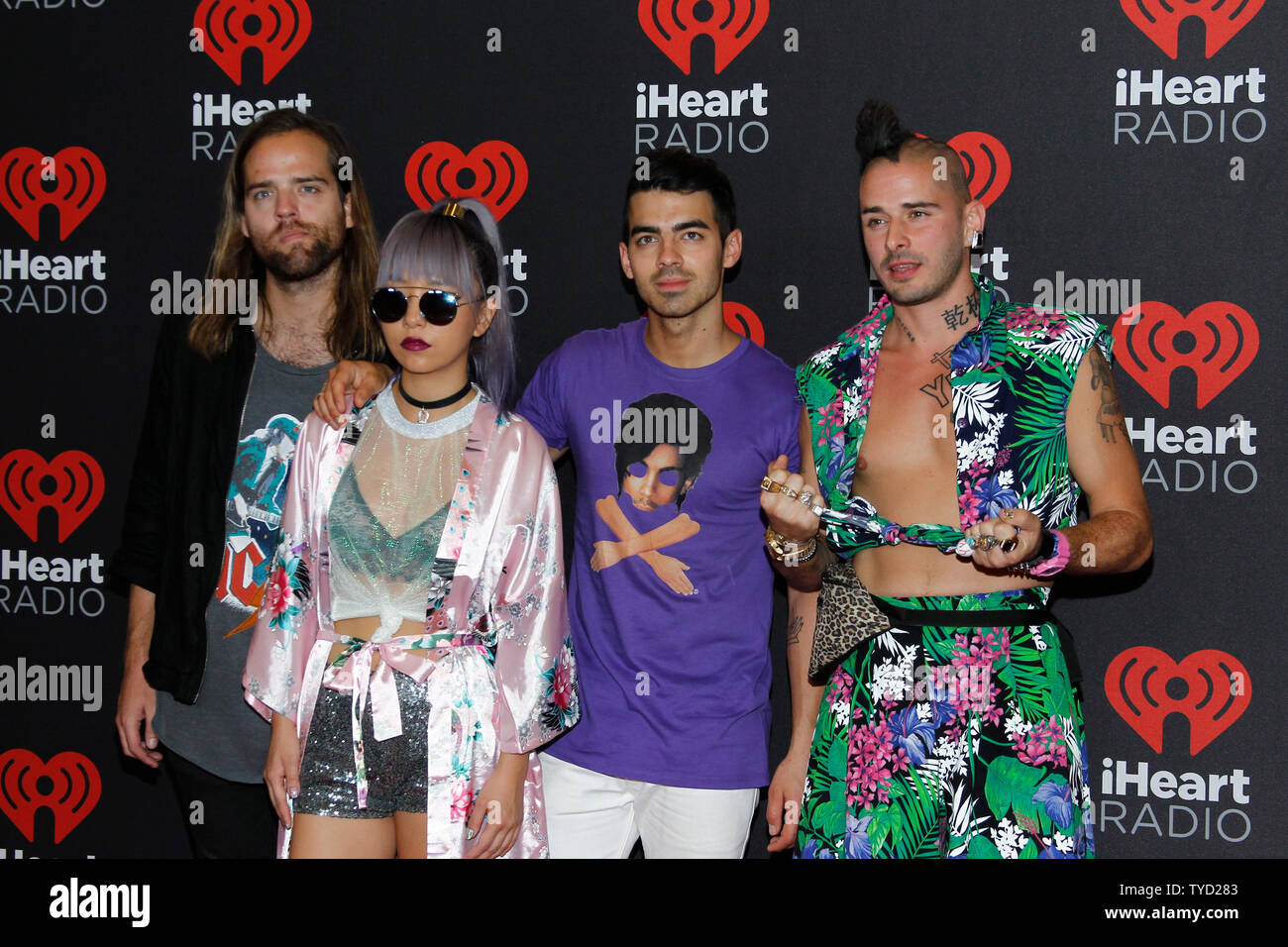 Pop band DNCE arrives for the iHeartRadio Music Festival at the T ...