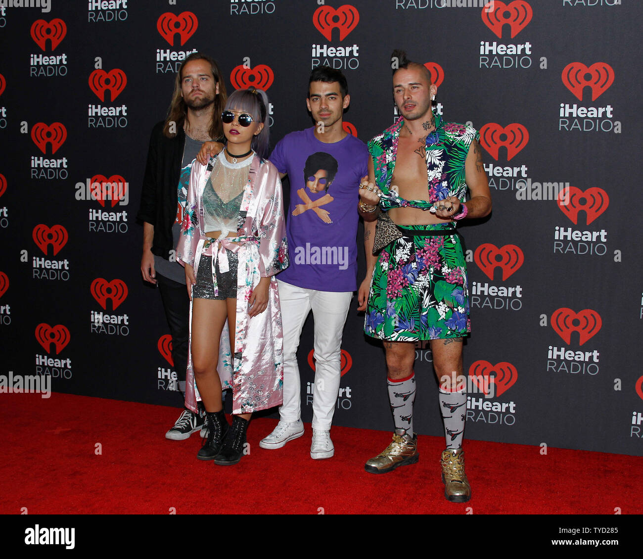 Pop band DNCE arrives for the iHeartRadio Music Festival at the T ...