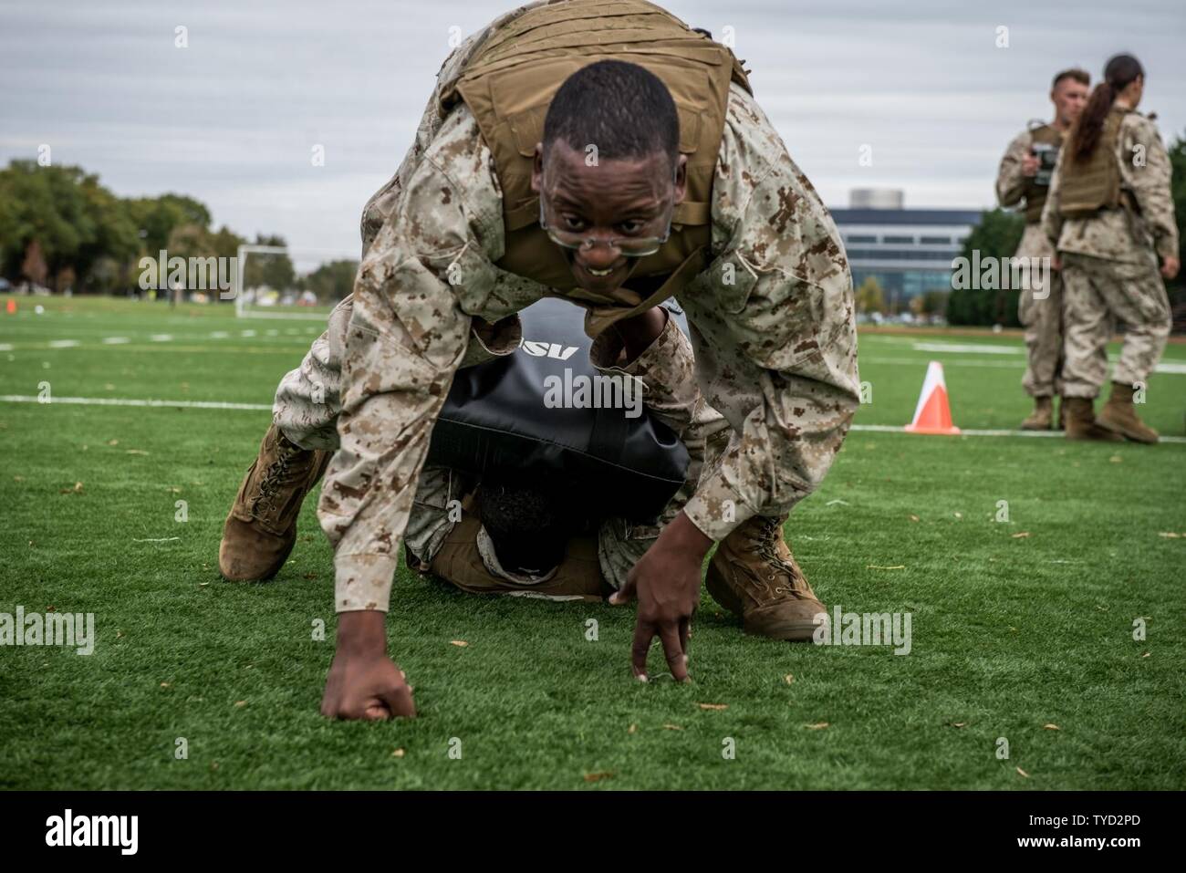 Lance Cpl. Michael J. Robinson drags his partner during the final ...