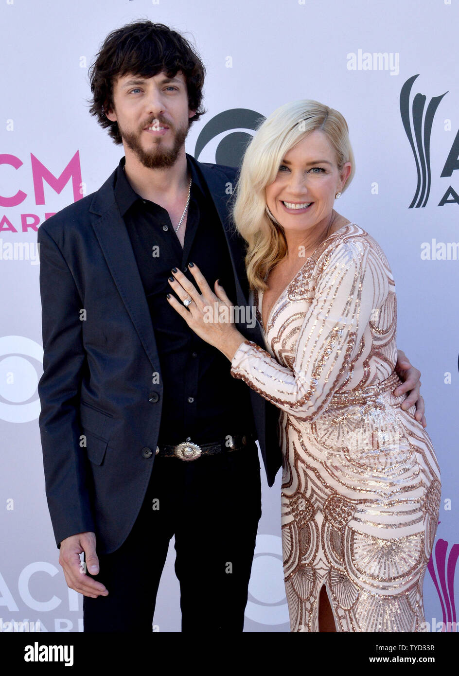 Recording artist Chris Janson (L) and Kelly Lynn attend the 52nd annual ...