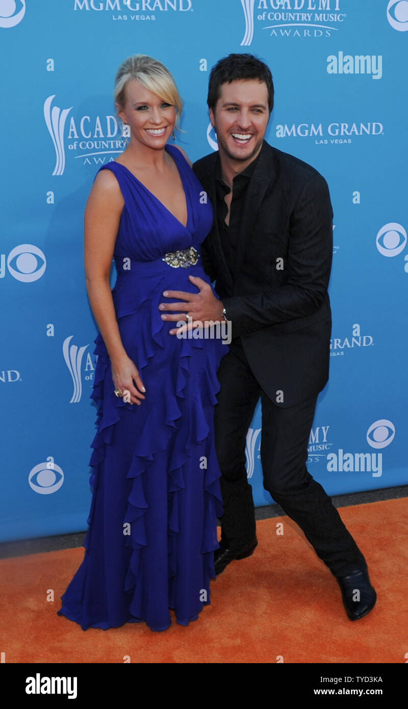 Luke Bryan and his wife Caroline arrive on the Orange Carpet at the ...