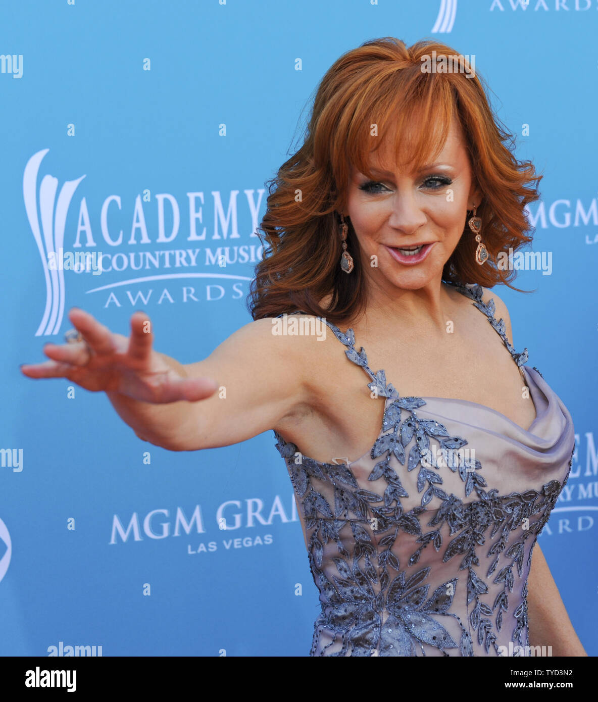Reba McEntire arrives on the Orange Carpet at the Academy of Country ...